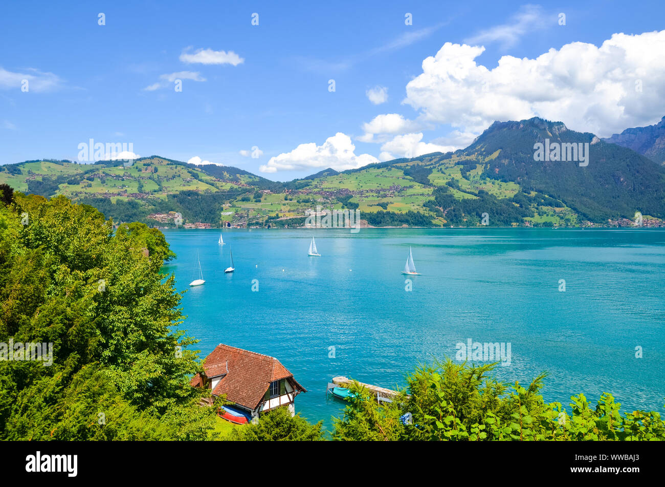 Amazing Lake Thun in Switzerland photographed with sailboats during ...