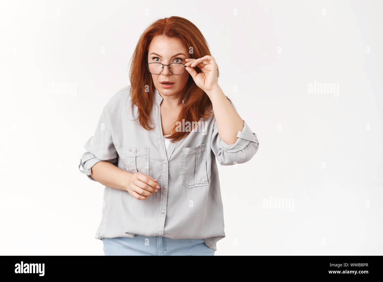Confused Stunned Speechless Redhead Middle Aged Woman Taking Off