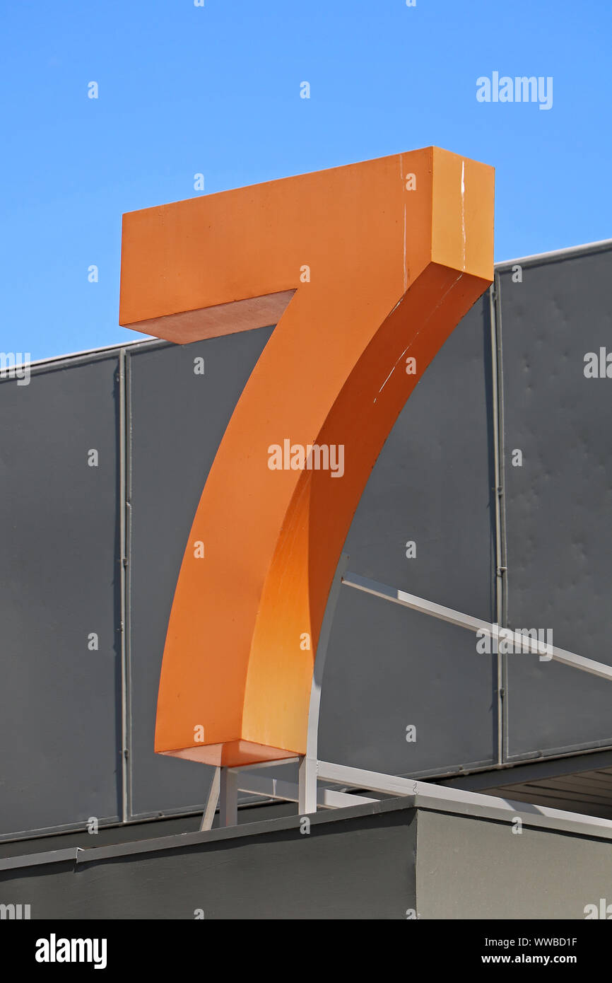 Number seven figure on building facade exterior Stock Photo - Alamy