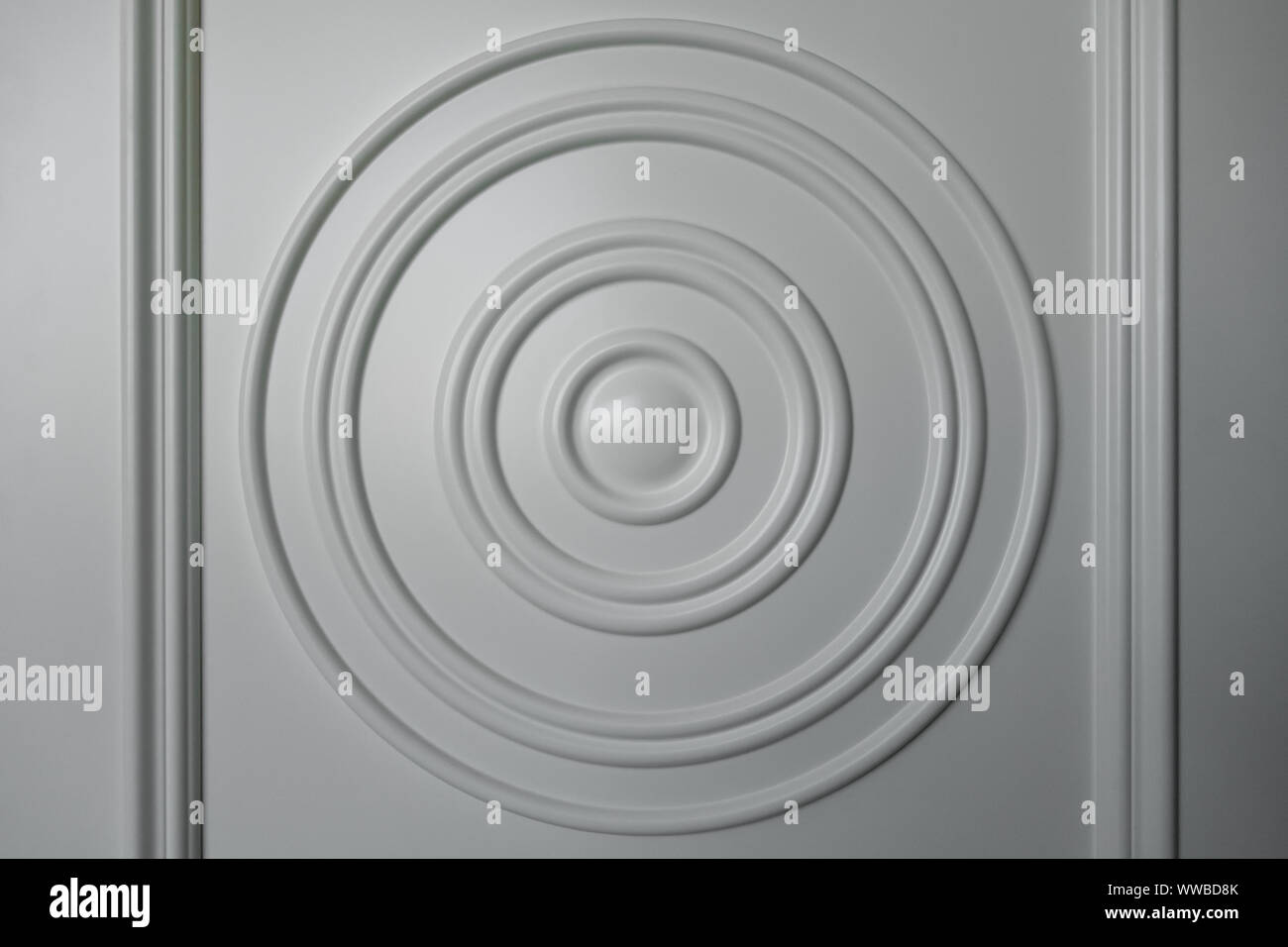 Textured relief pattern in the form of circles and lines of gray color ...