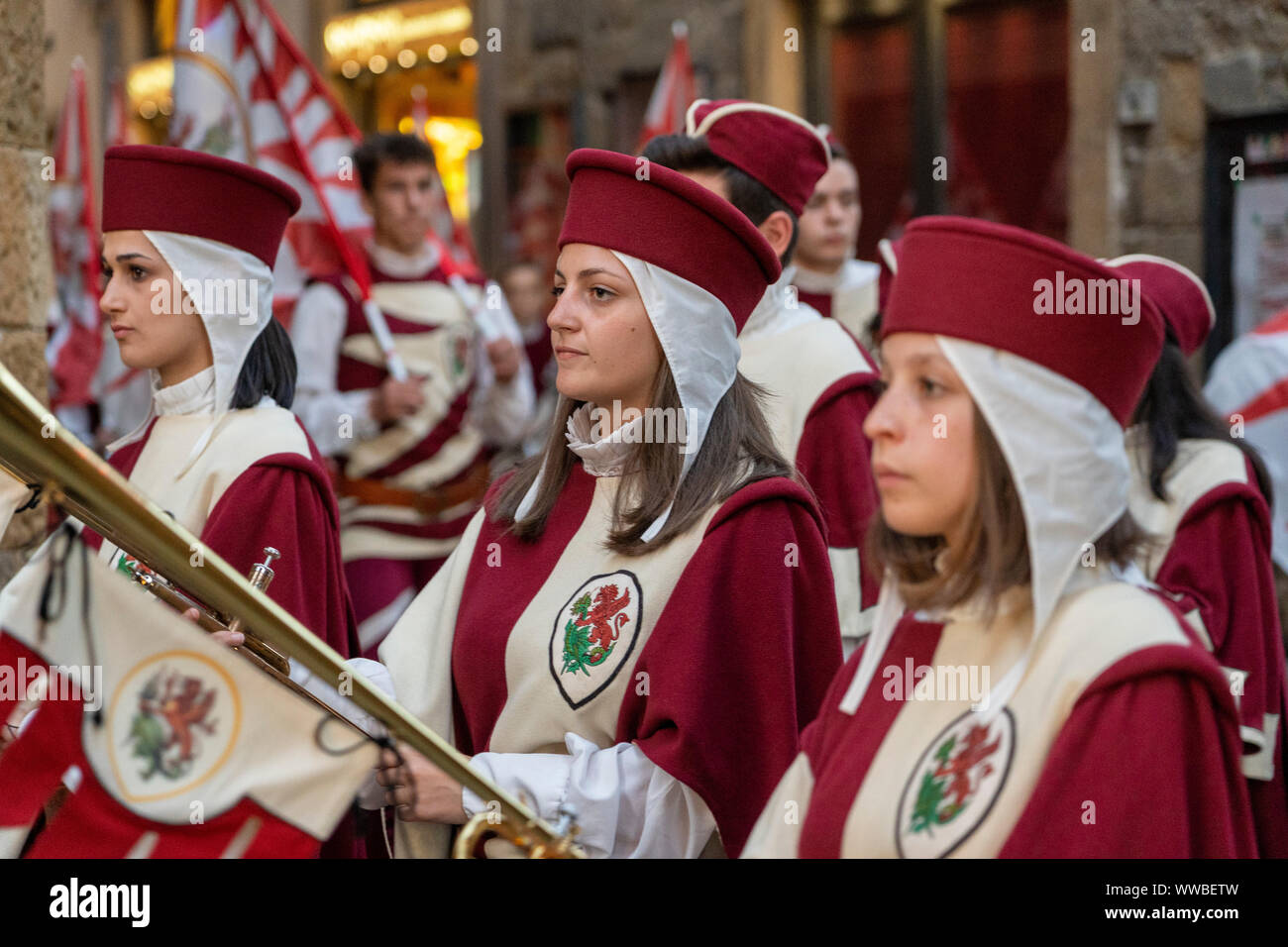 Volterra, Pisa, Tuscany, Italy: medieval procession with flags and ...