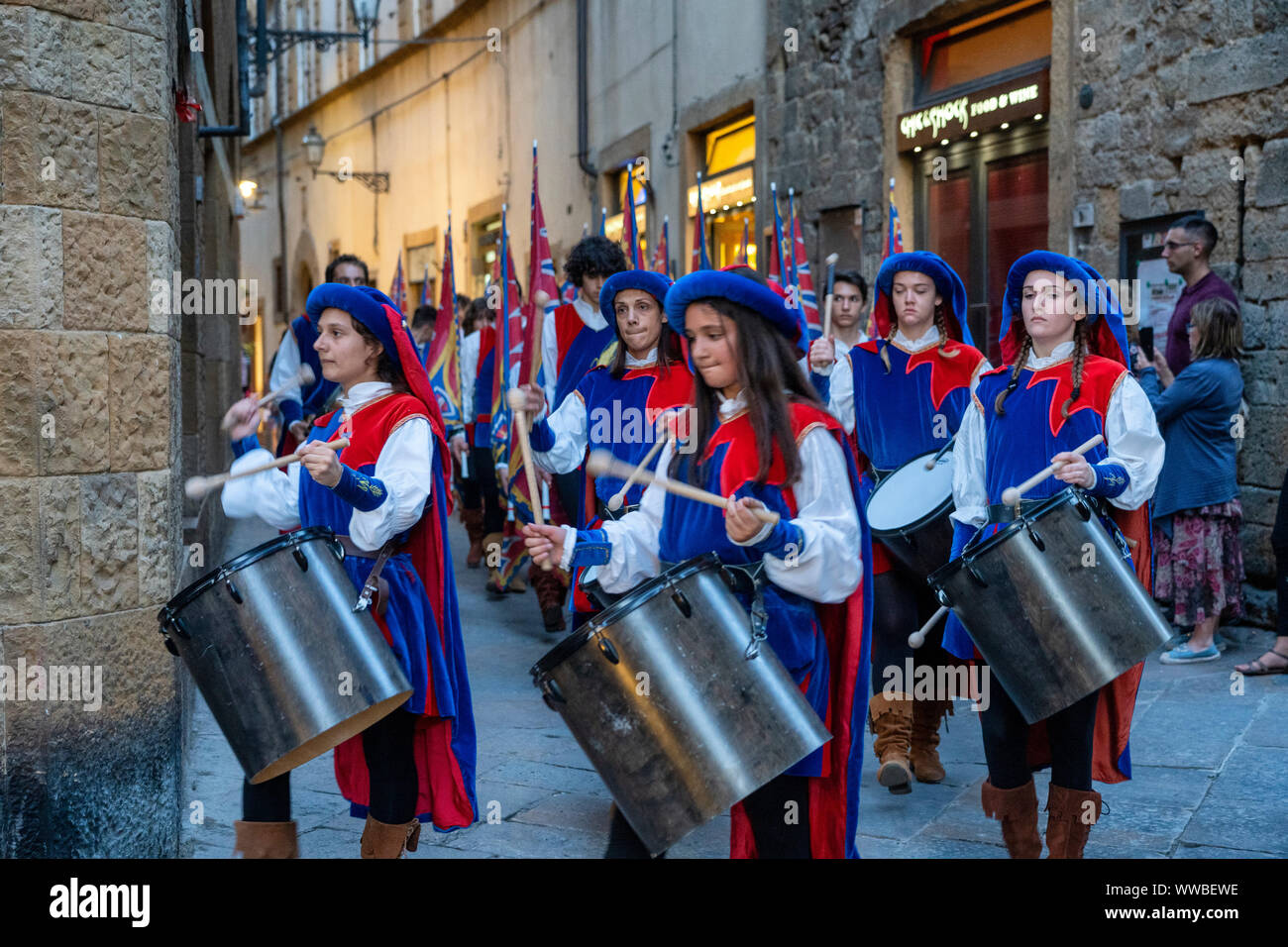 Volterra, Pisa, Tuscany, Italy: medieval procession with flags and ...