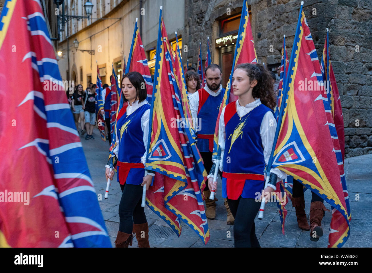Volterra, Pisa, Tuscany, Italy: medieval procession with flags and ...