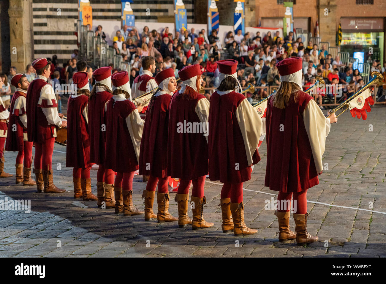 Volterra, Pisa, Tuscany, Italy: medieval feast with flags and ...