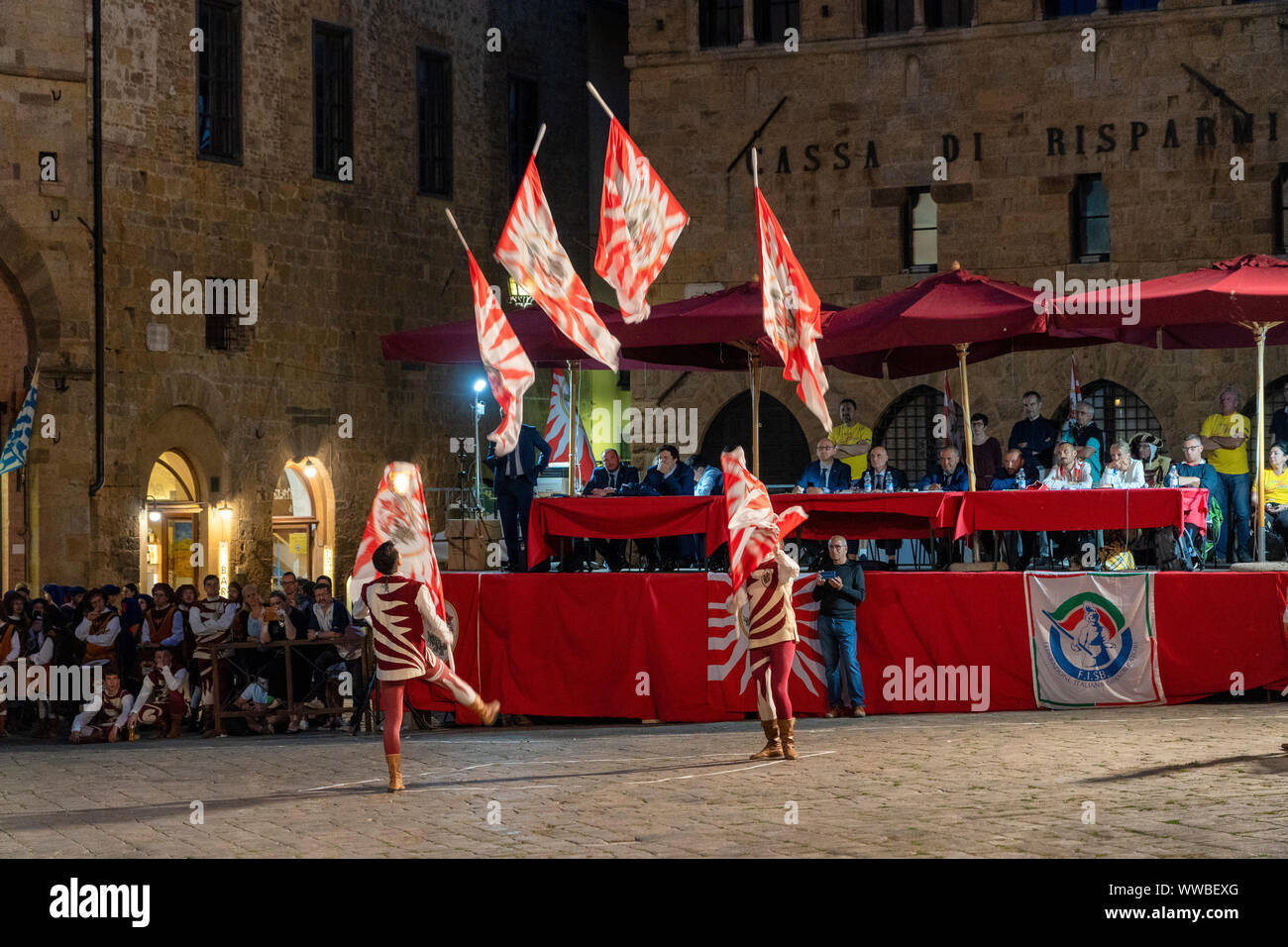 Volterra, Pisa, Tuscany, Italy: medieval feast with flags and ...