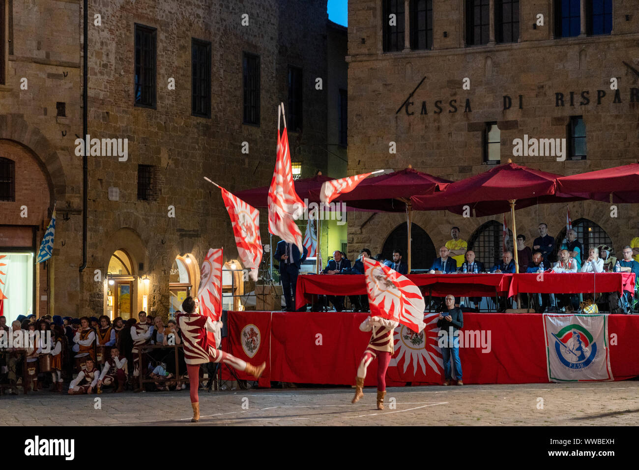 Volterra, Pisa, Tuscany, Italy: medieval feast with flags and ...