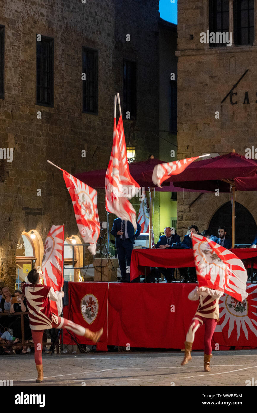 Volterra, Pisa, Tuscany, Italy: medieval feast with flags and ...
