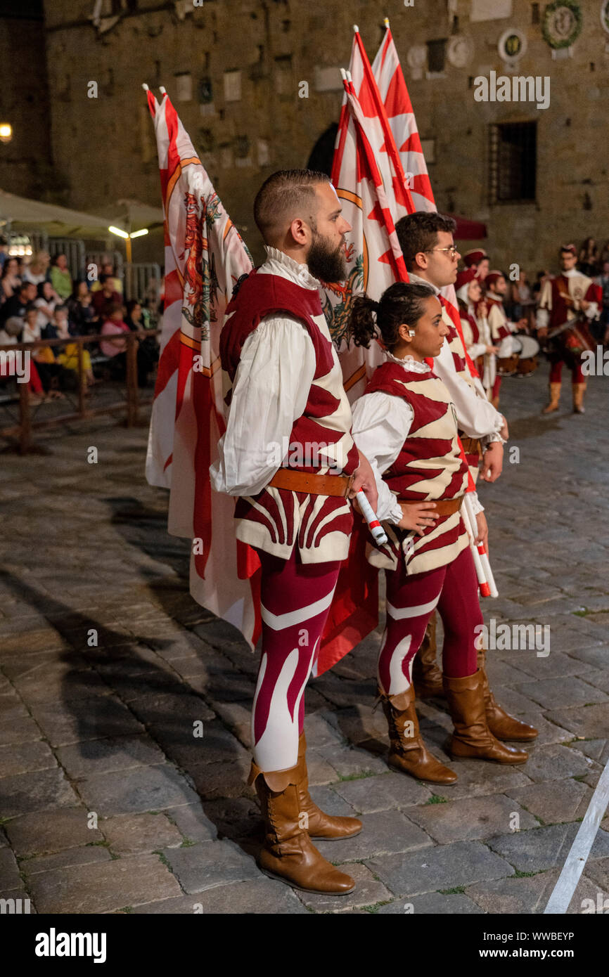 Volterra, Pisa, Tuscany, Italy: medieval feast with flags and ...