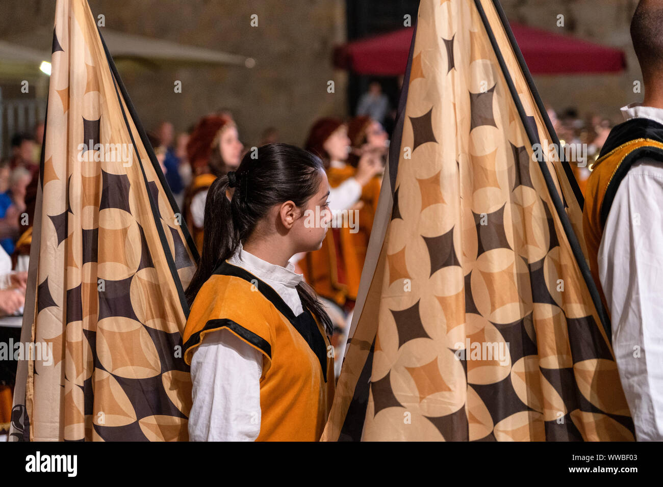 Volterra, Pisa, Tuscany, Italy: medieval feast with flags and ...