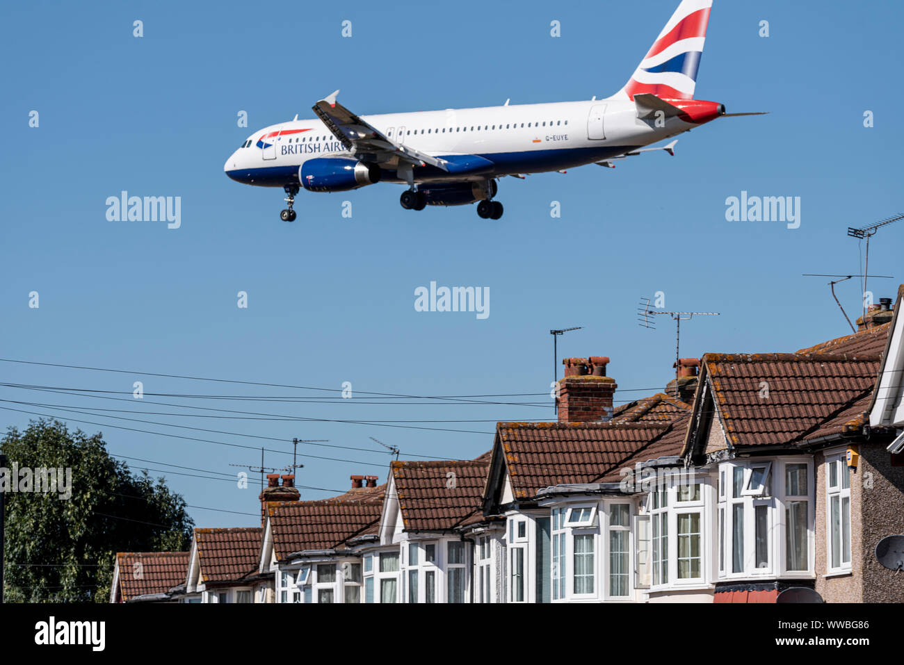 Plane Over House High Resolution Stock Photography and Images - Alamy