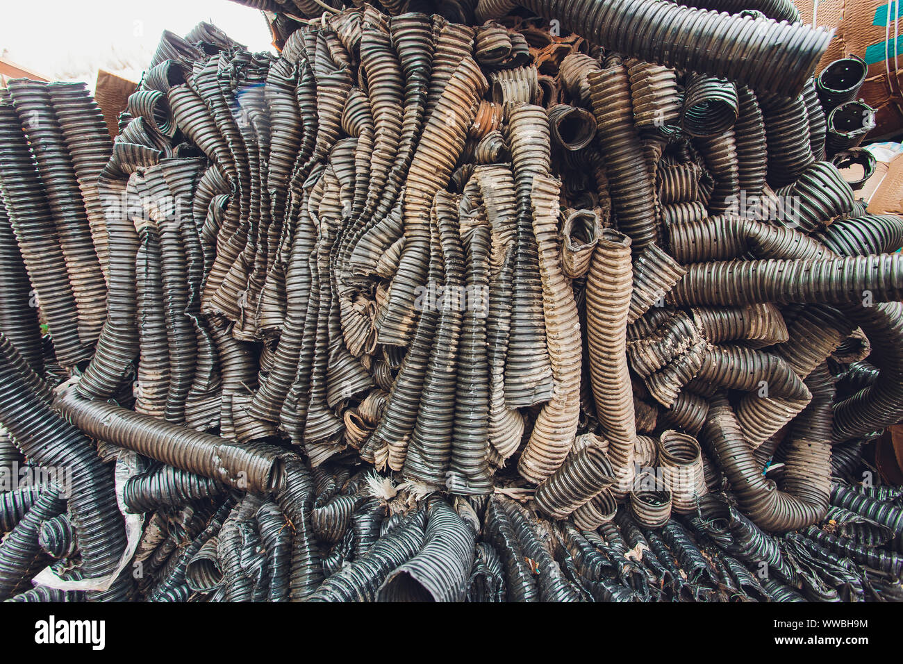 plastic pipe and materials for constructions waste sorting Stock Photo ...