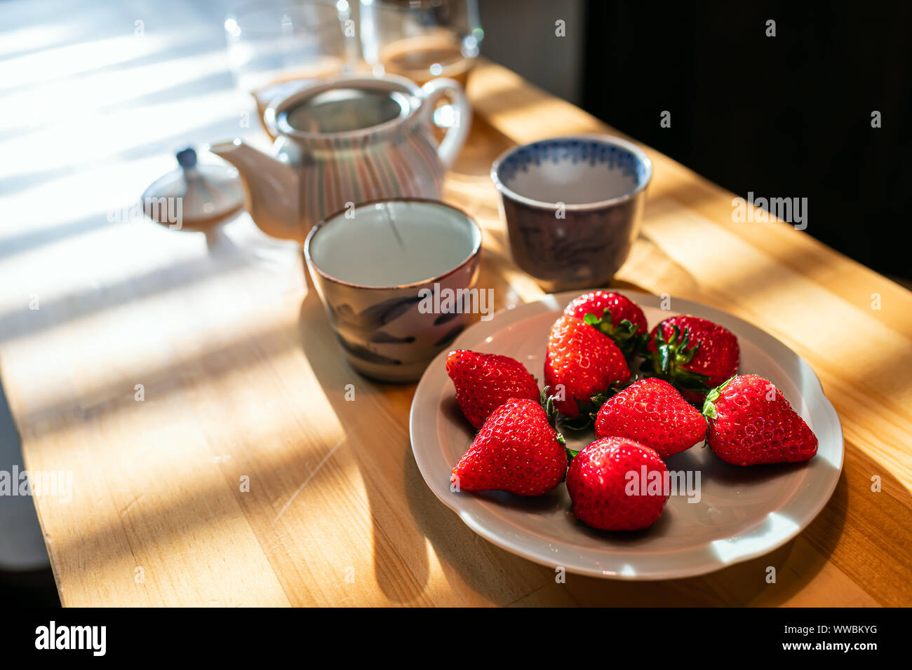 Traditional Japanese dessert plump expensive strawberries on plate at ...