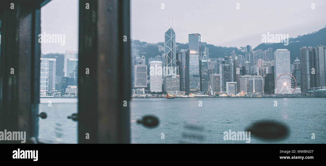 View from window of Star ferry, Victoria harbour skyline Stock Photo ...