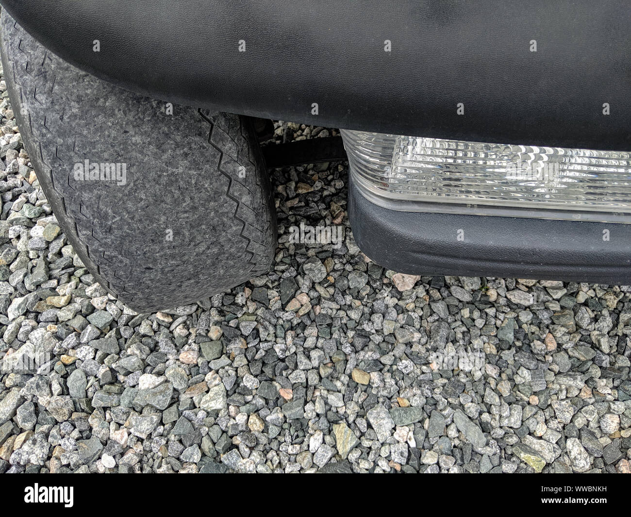 Worn out bald golf cart tires. Treadless old tires Stock Photo - Alamy