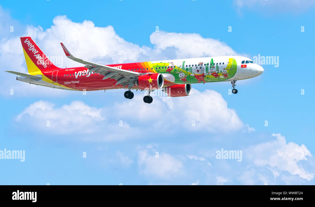 Airplane airbus A321 of VietJet Air flying through sky prepare to ...