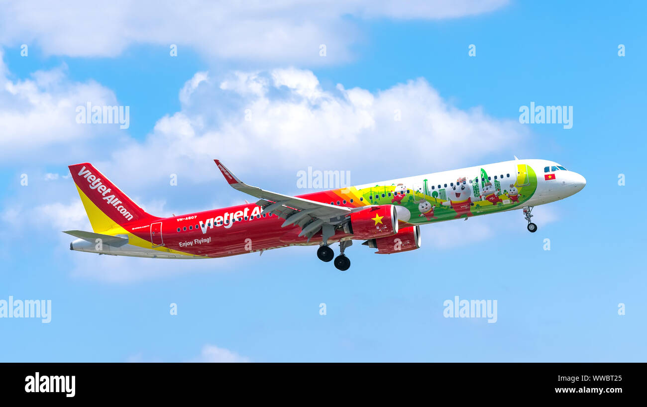 Airplane airbus A321 of VietJet Air flying through sky prepare to ...