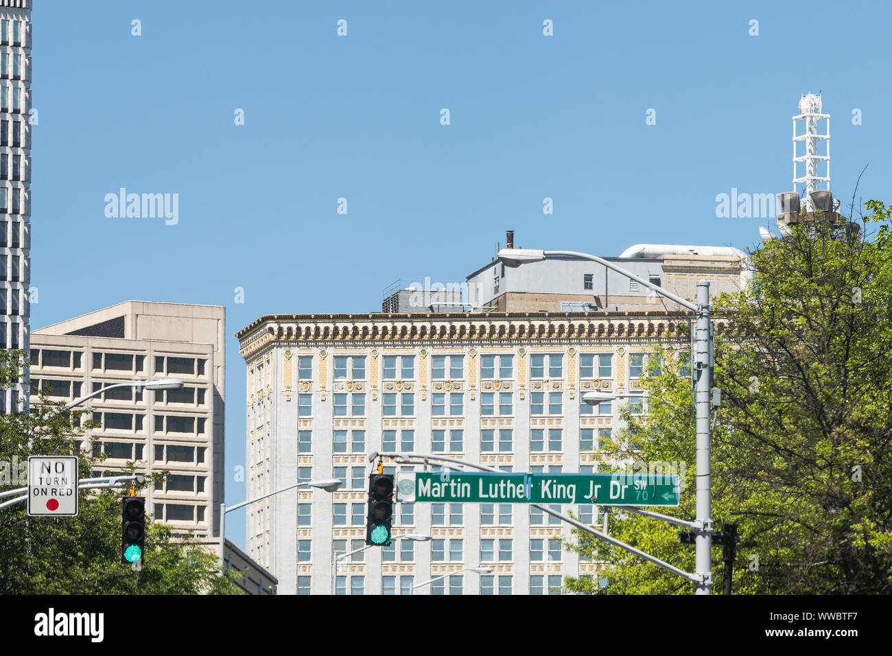 Road street sign for Martin Luther King Jr drive with traffic stoplight ...
