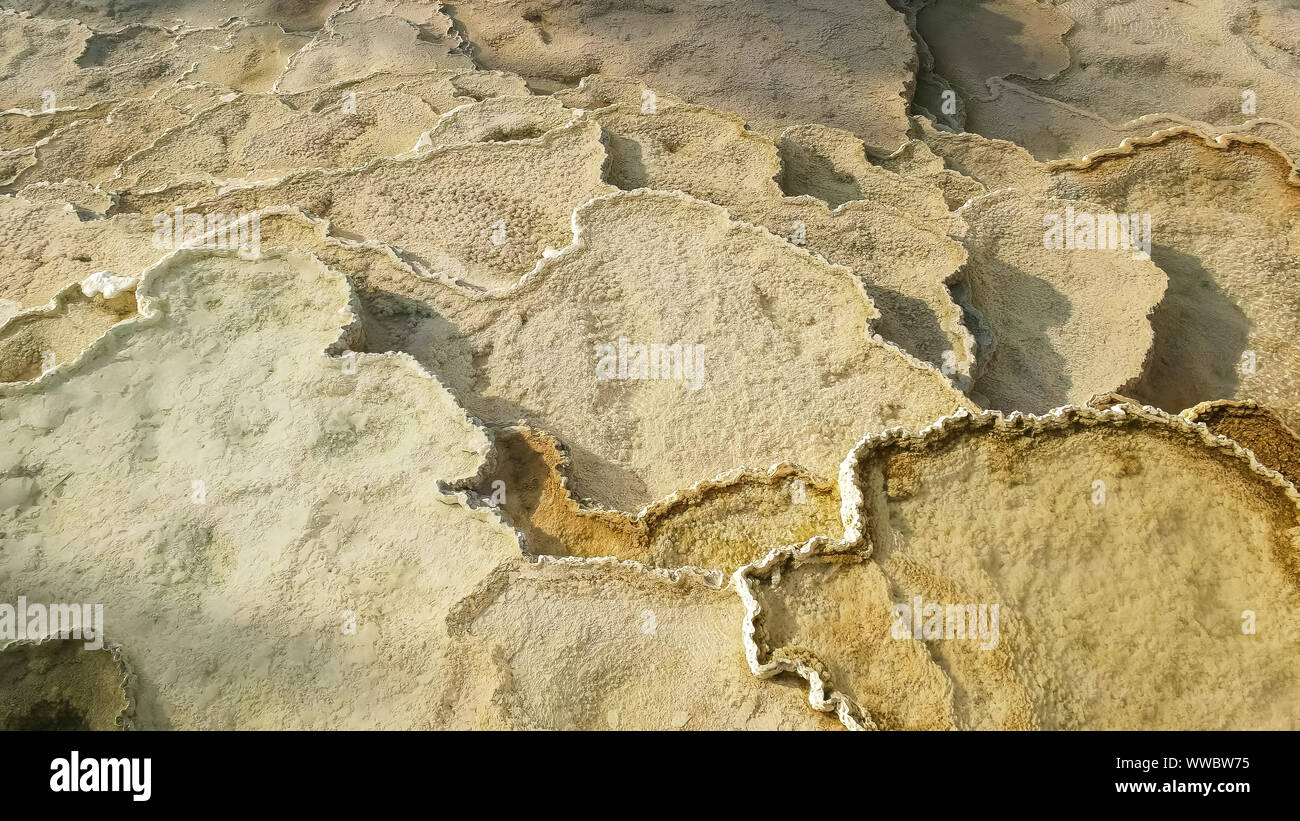 a high angle close up shot of mineral terraces at mammoth hot springs ...