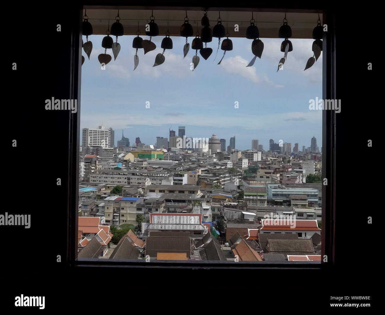 a view of bangkok through a window from phu khao thong, golden mount ...