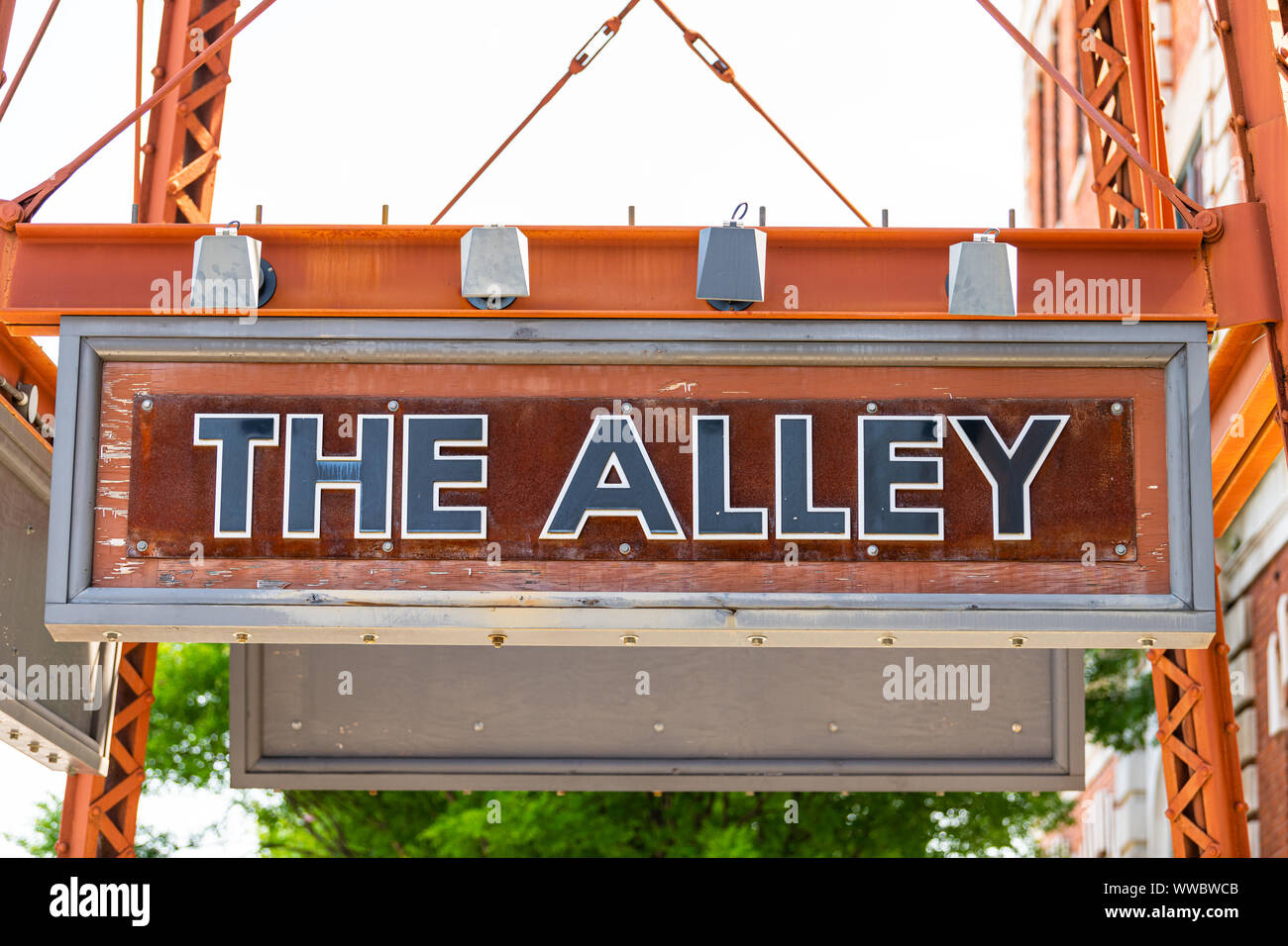 Sign for the Alley entertainment, shopping and restaurant street ...