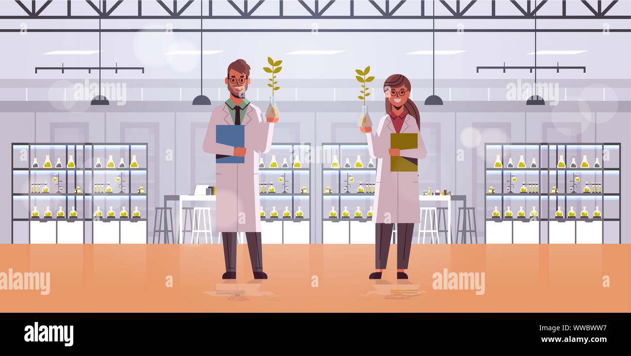 scientists couple examining plants sample in test tubes man woman in ...