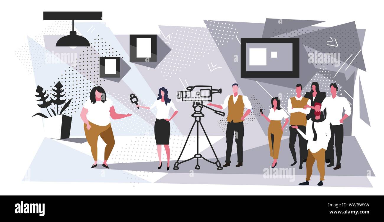 female presenter interviewing with crew reporter taking interview with ...