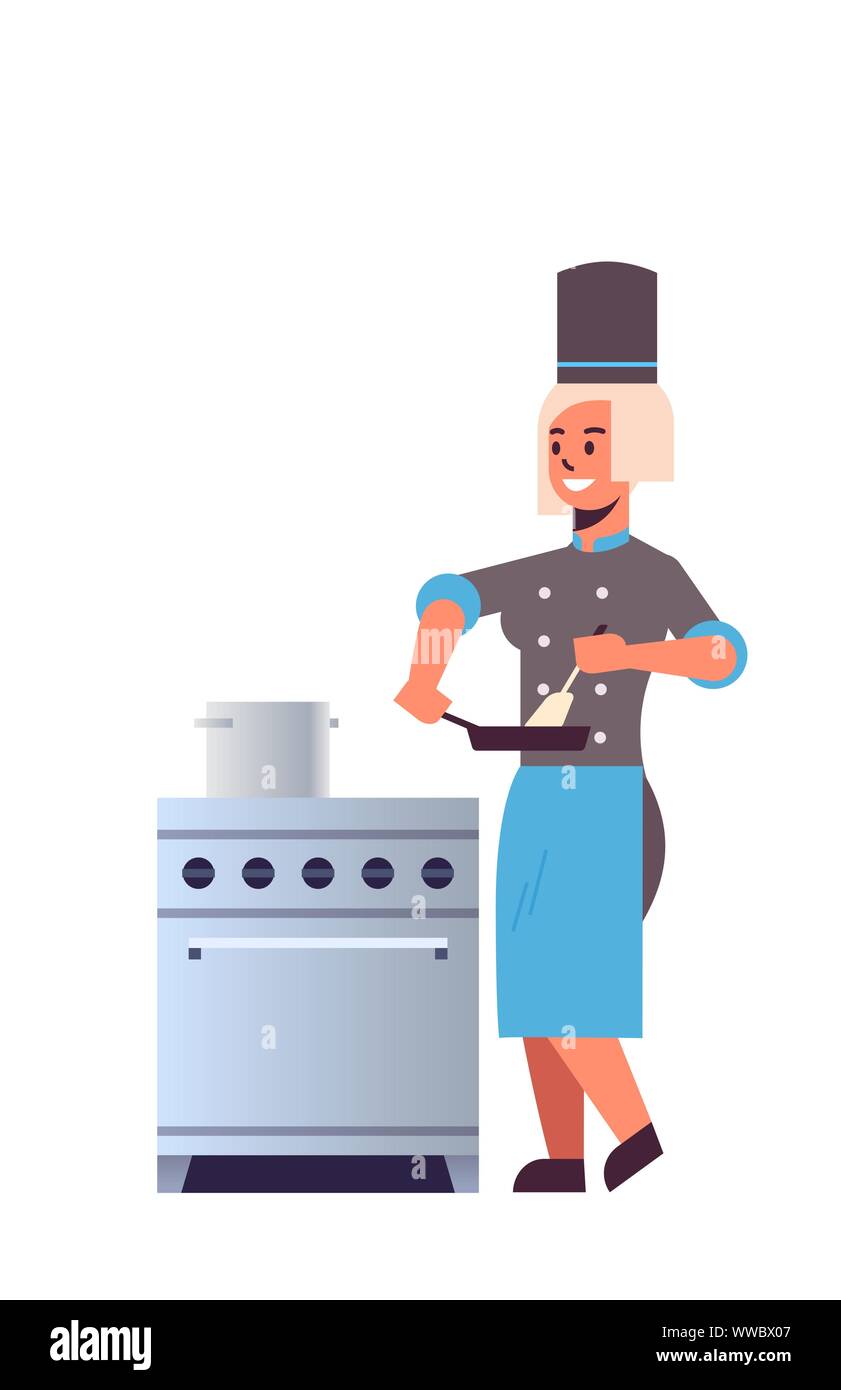 female professional chef using frying pan stirring food woman ...