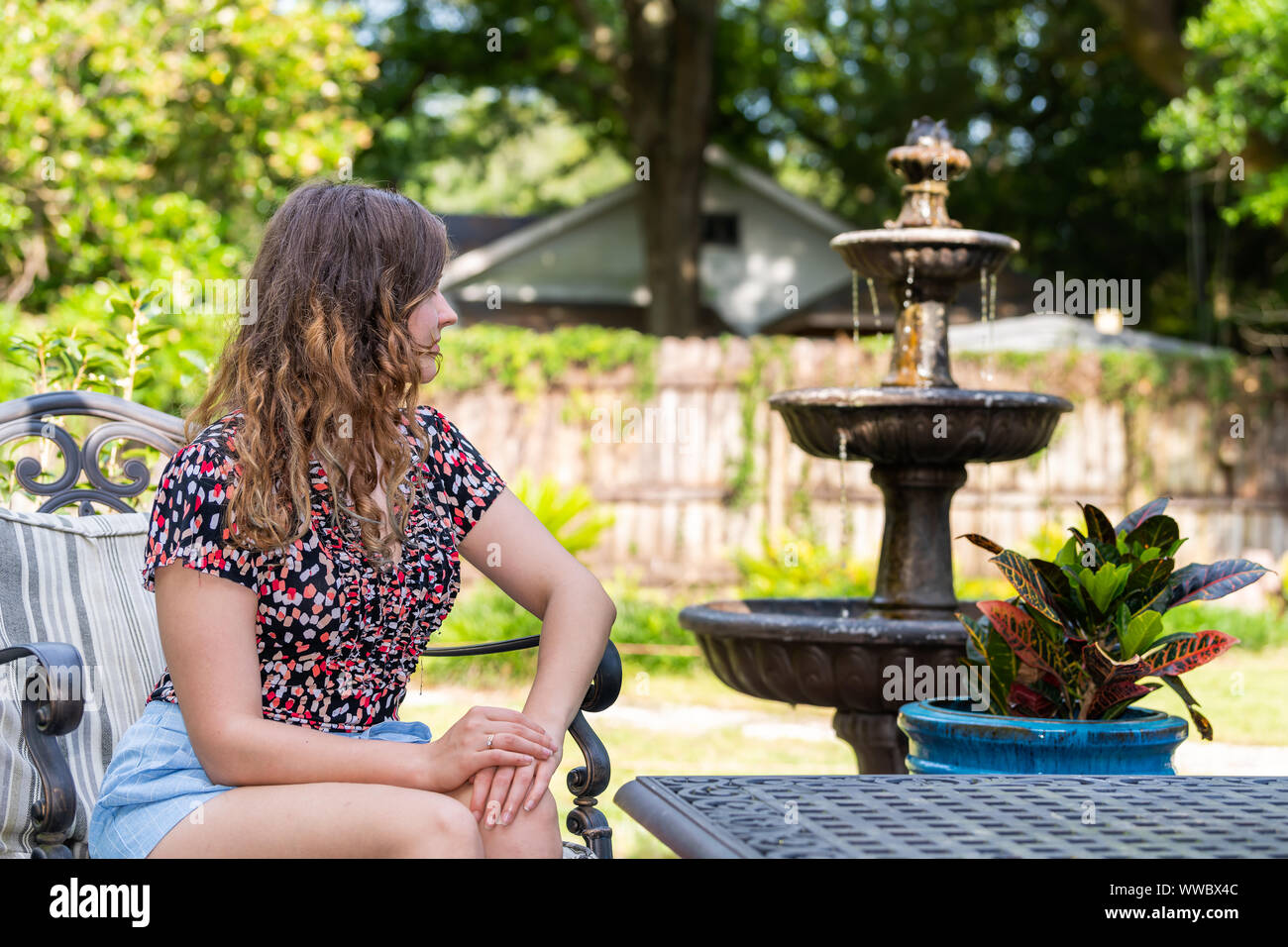 Beautiful Woman Sitting Patio Table High Resolution Stock Photography ...