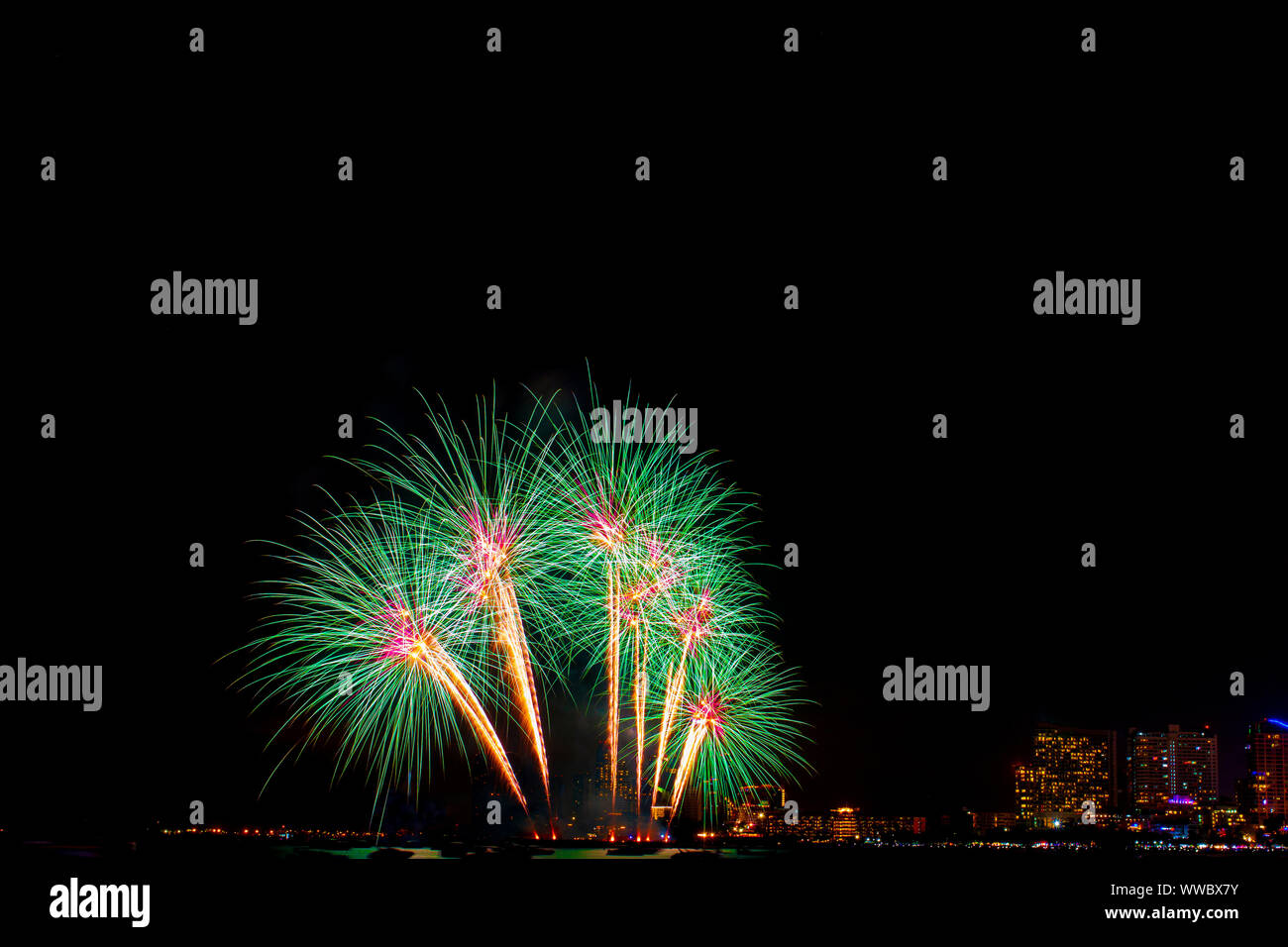 Beautiful colorful fireworks display on the sea beach, Amazing holiday ...