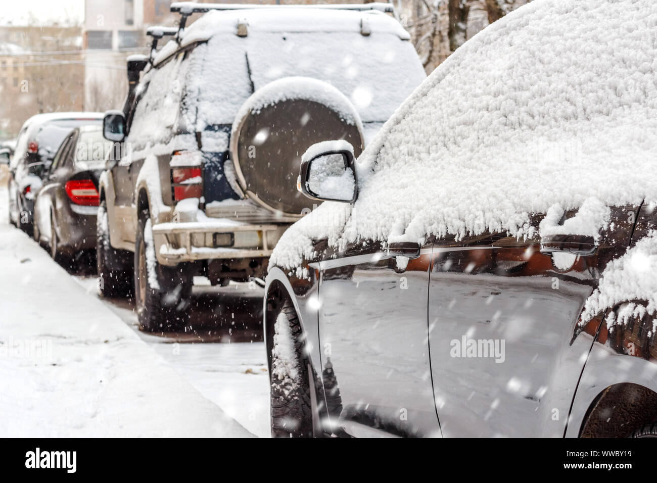 Snow on cars after snowfall Stock Photo - Alamy