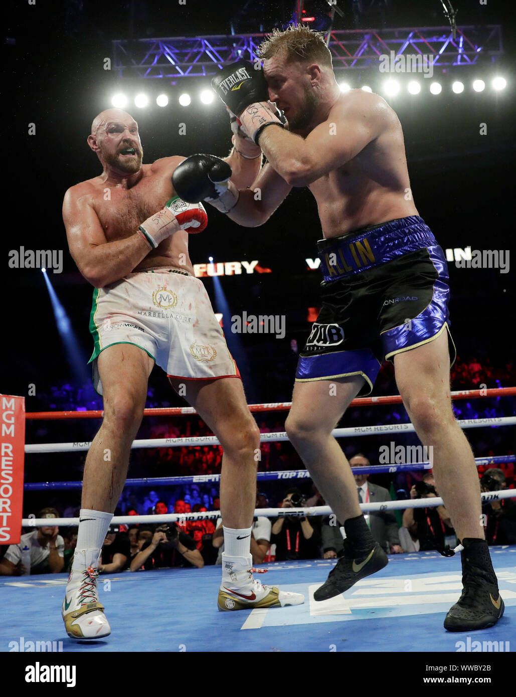 Tyson Fury, left, of England, fights Otto Wallin, of Sweden, during ...