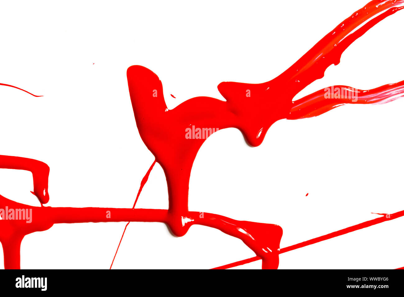 Red paint close up on a white background Stock Photo - Alamy