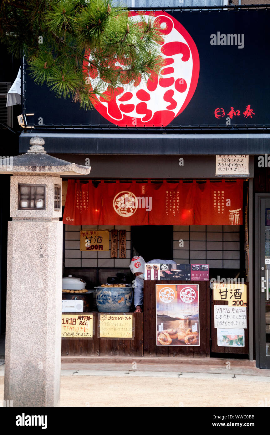Japanese food vendor on Miyajima Island Stock Photo - Alamy