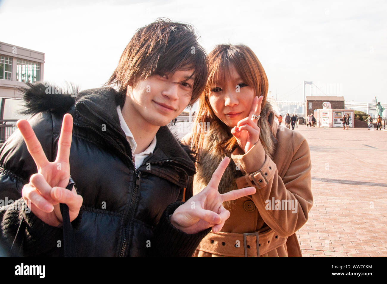 Hip Japanese couple in Odaiba in Tokyo Bay Stock Photo - Alamy