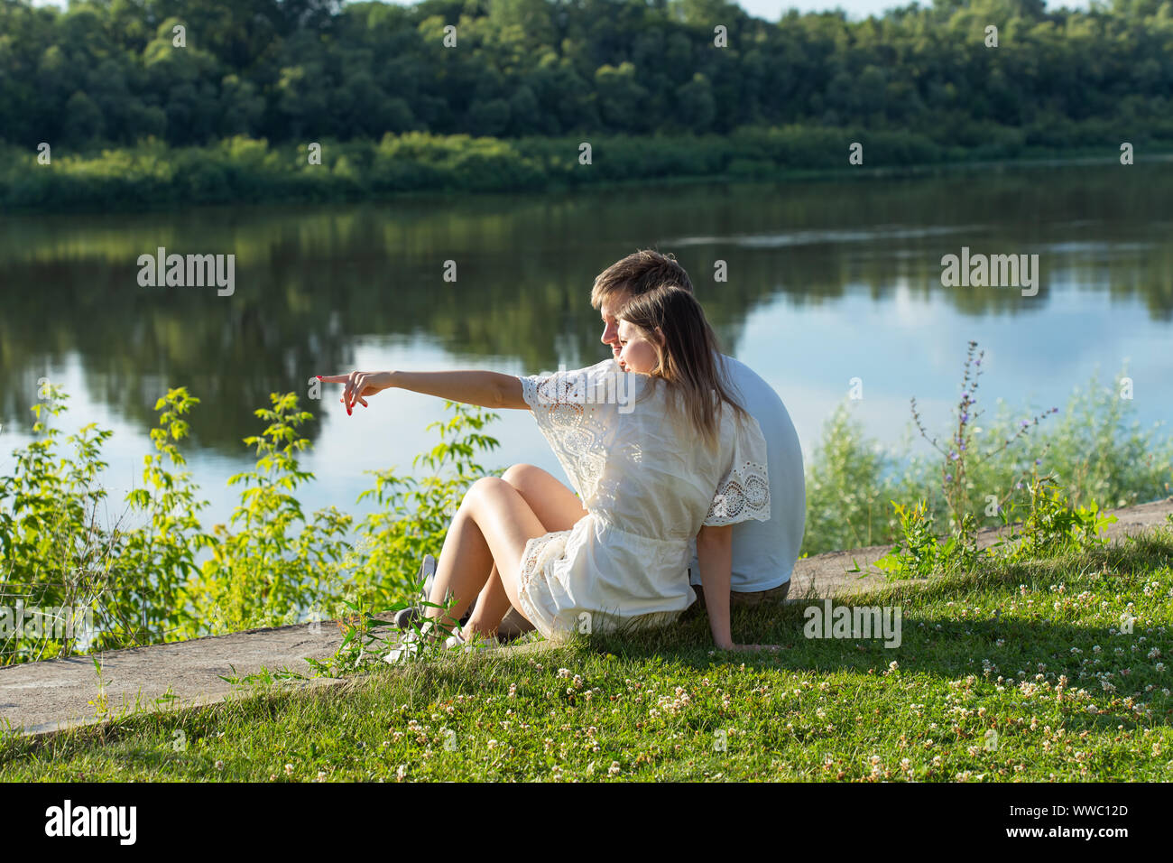 happy romantic couple in love and having fun outdoor in summer day ...
