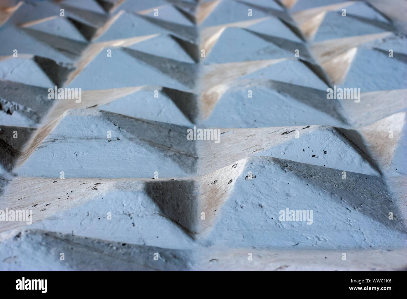 Abstract grunge background. Concrete faceted geometric figures of a ...