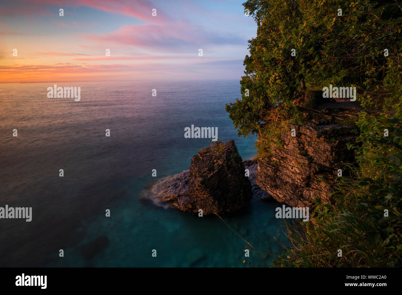 Lake Michigan shoreline at sunrise Stock Photo - Alamy