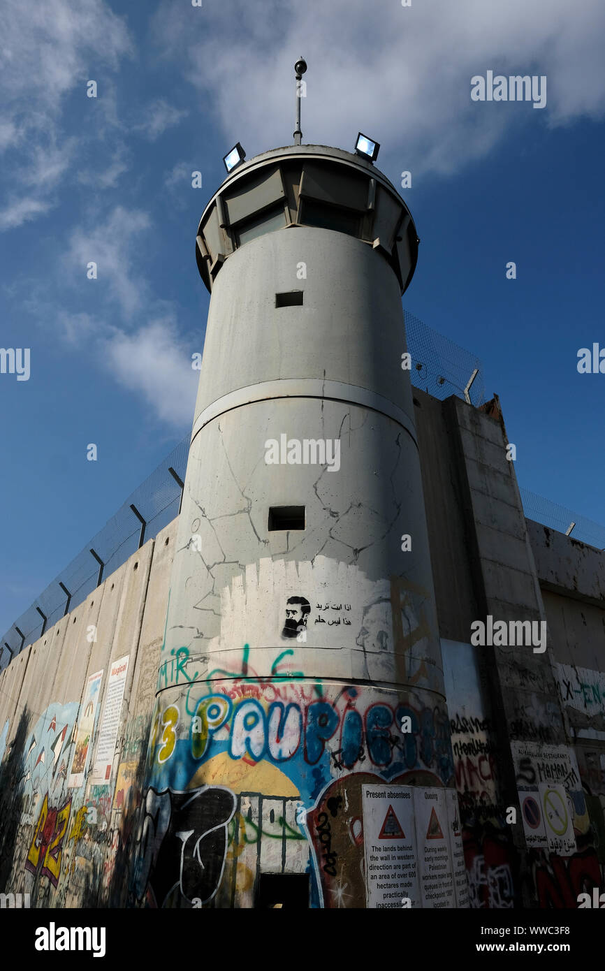 An Israeli military watchtower on a section of the separation barrier ...