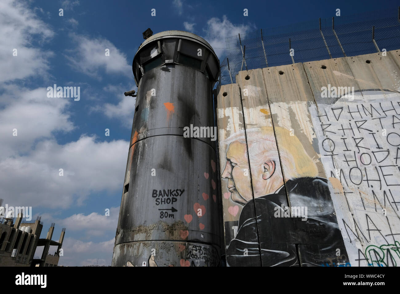 An Israeli military watchtower on a section of the separation barrier ...