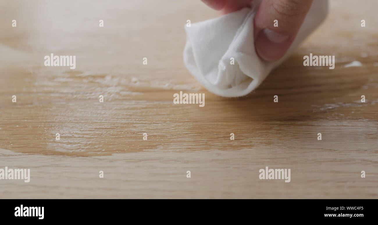 applying oil finish to oak surface with cloth, wide photo Stock Photo ...