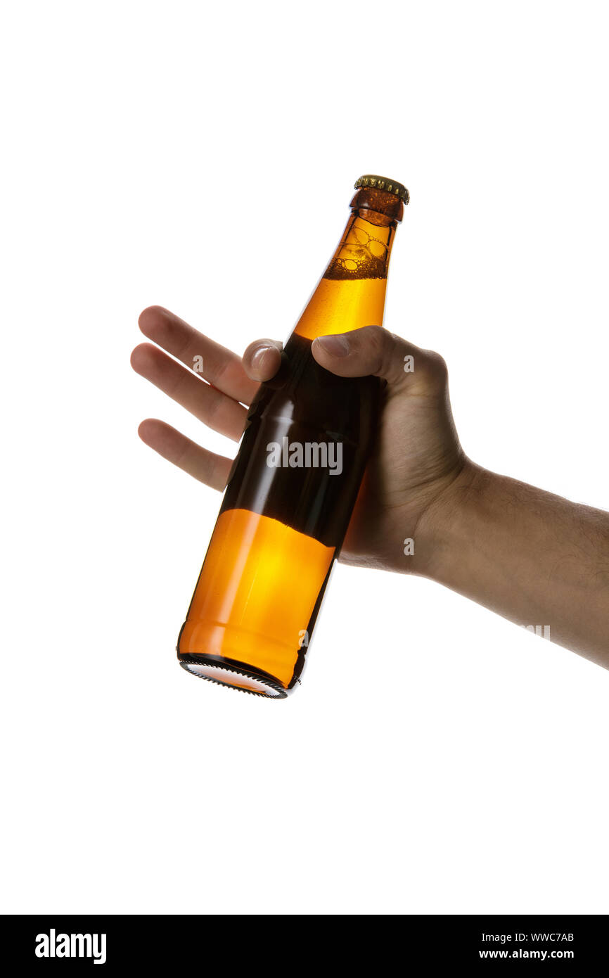male hand holding brown beer bottle without label isolated on white ...
