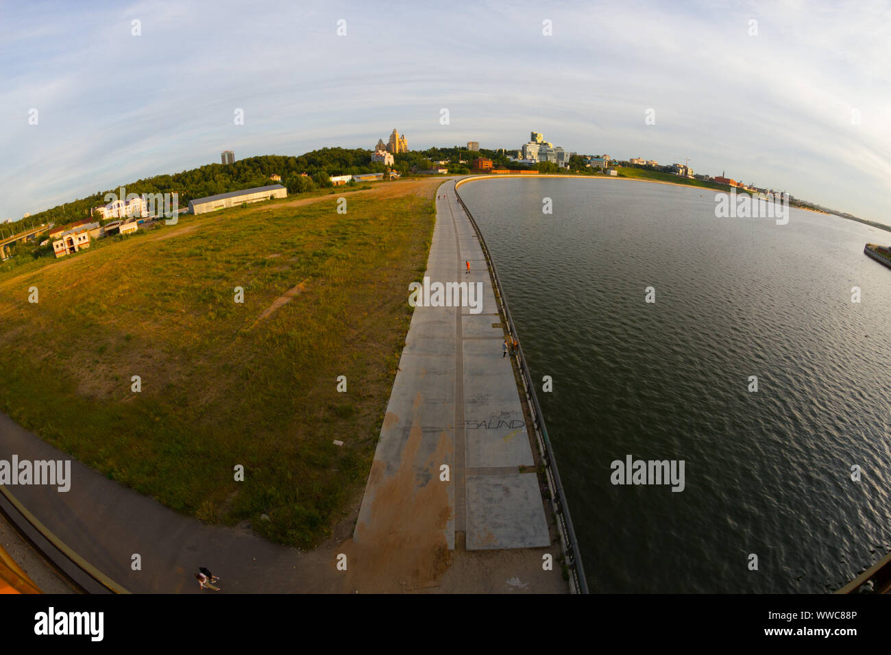 Aerial view on river bank in city Stock Photo - Alamy