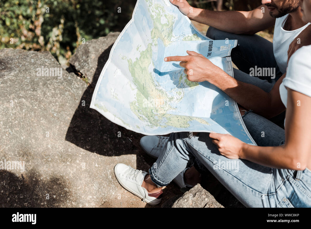 Man pointing finger world map hi-res stock photography and images - Alamy