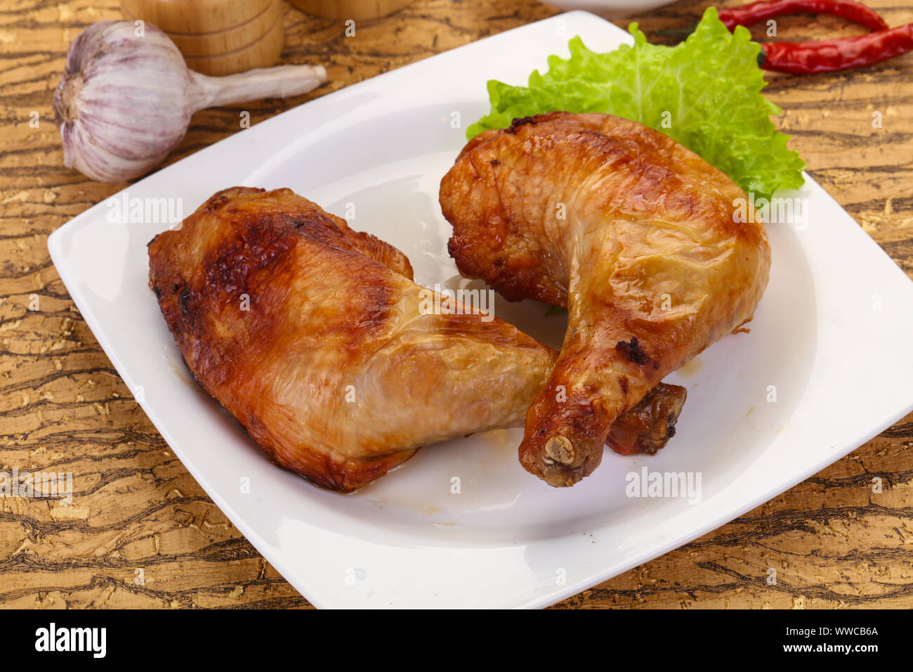 Crispy tasty Roasted chicken leg Stock Photo - Alamy