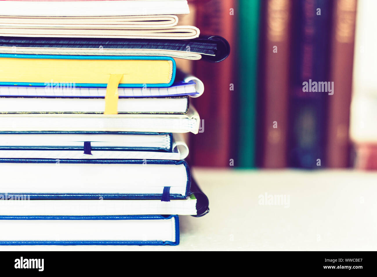 Notebooks piles, stack of books education back to school background ...