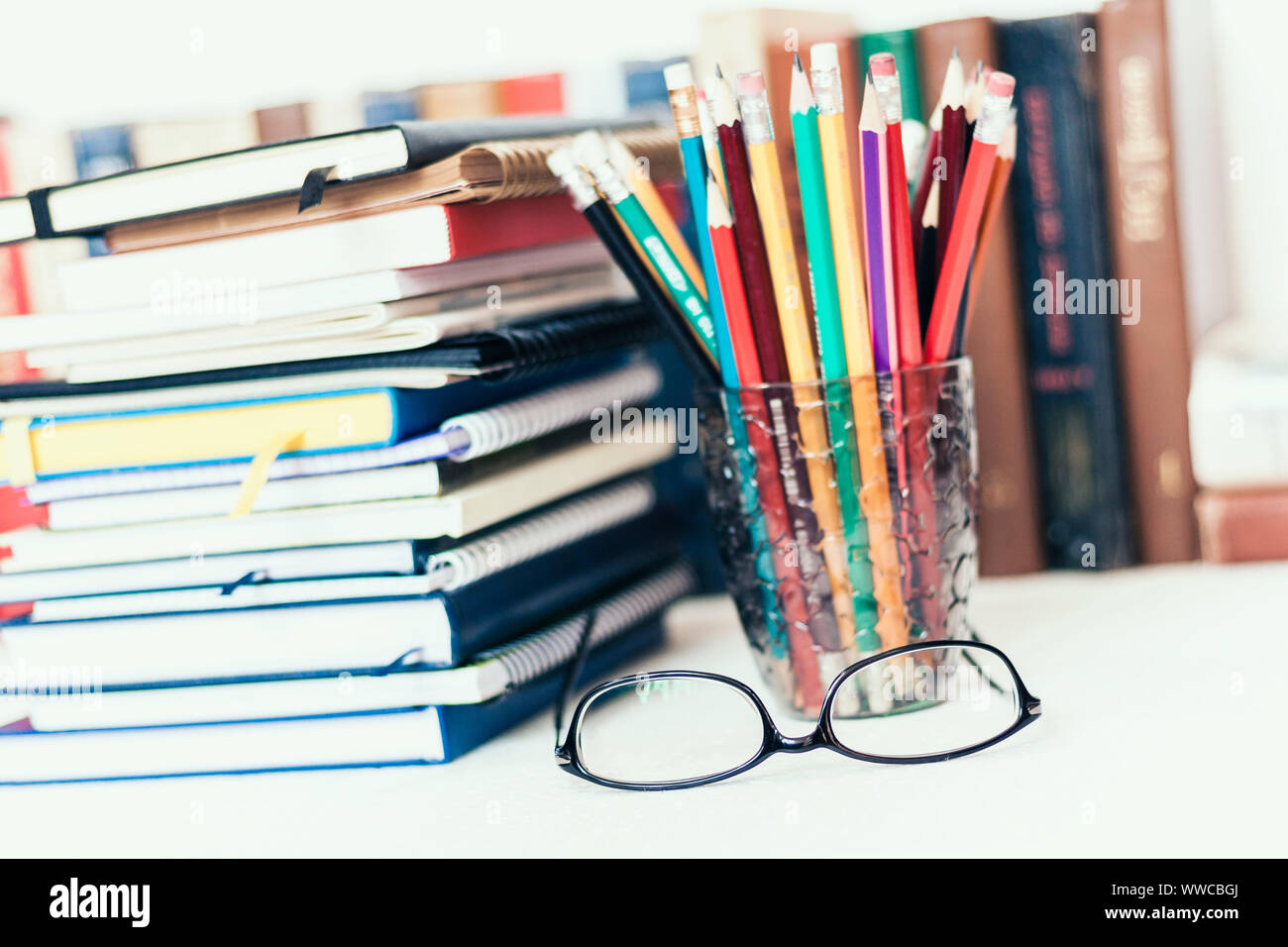 Notebooks piles, stack of books education back to school background ...