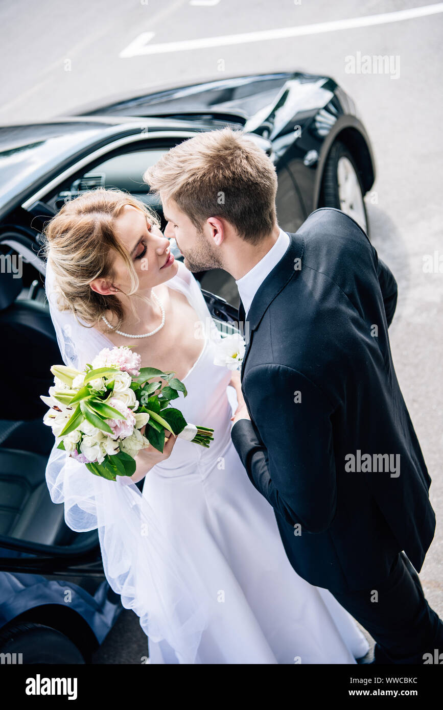 Bride kissing flower girl hi-res stock photography and images - Alamy