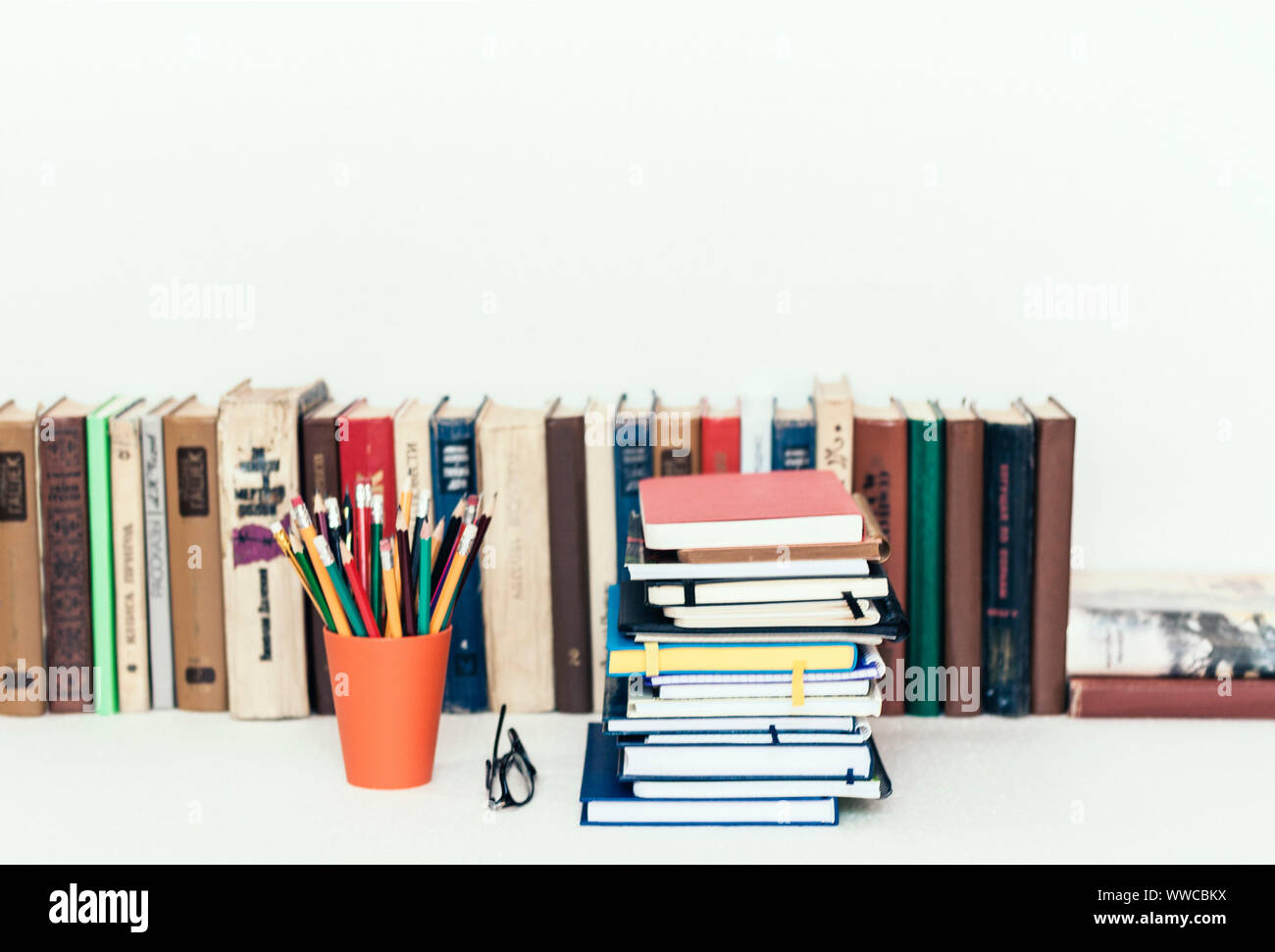 Notebooks piles, stack of books education back to school background ...