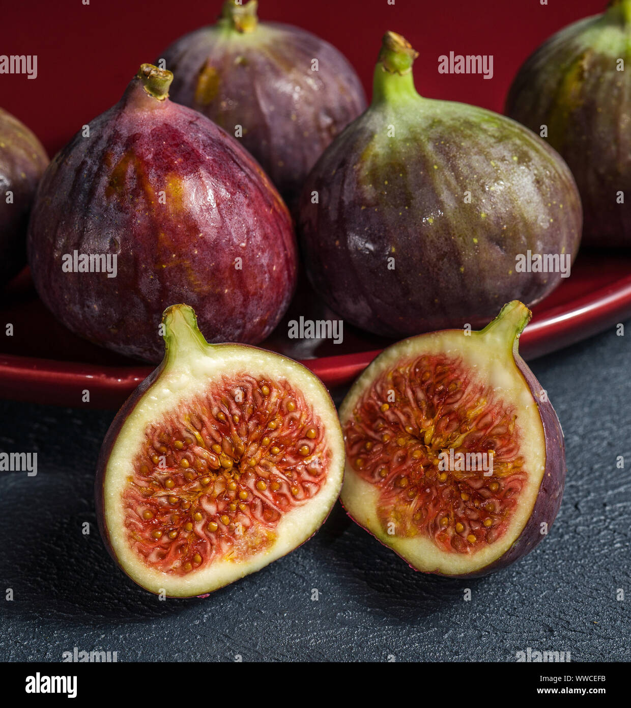 fresh figs close-up photo on dark background. dark moody photo Stock ...