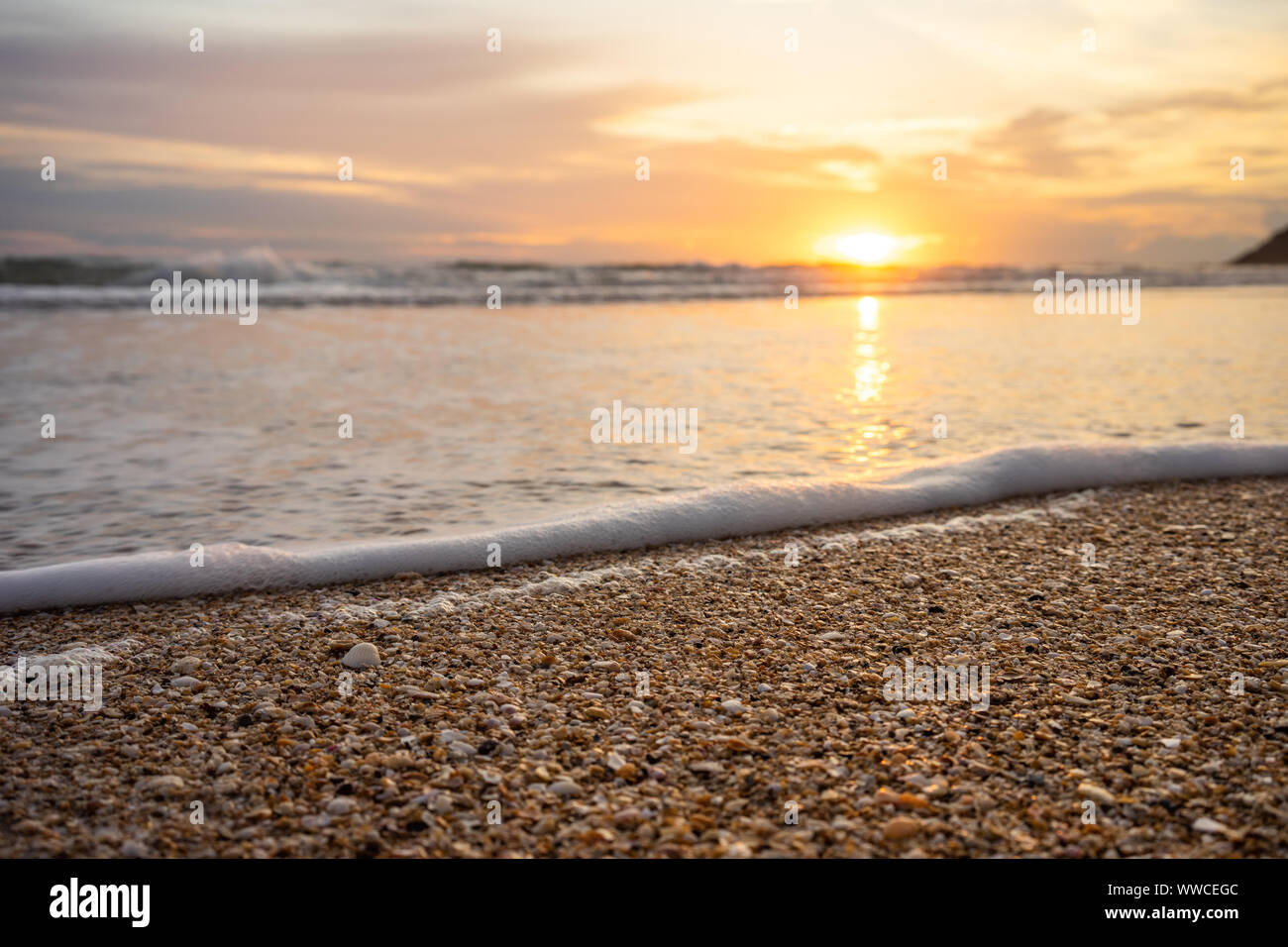 Yellow warm sand and summer sea with blue sky and copy space. Sea view ...